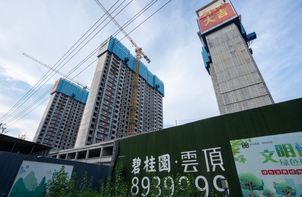China real estate crisis duration and global impact